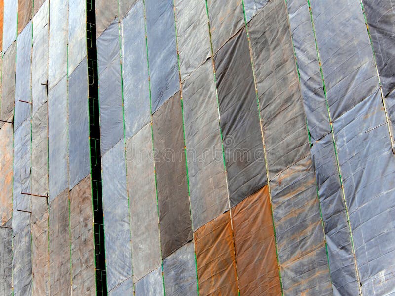 Several Large Canvases Stretch Together, Covered Building Under Stock ...