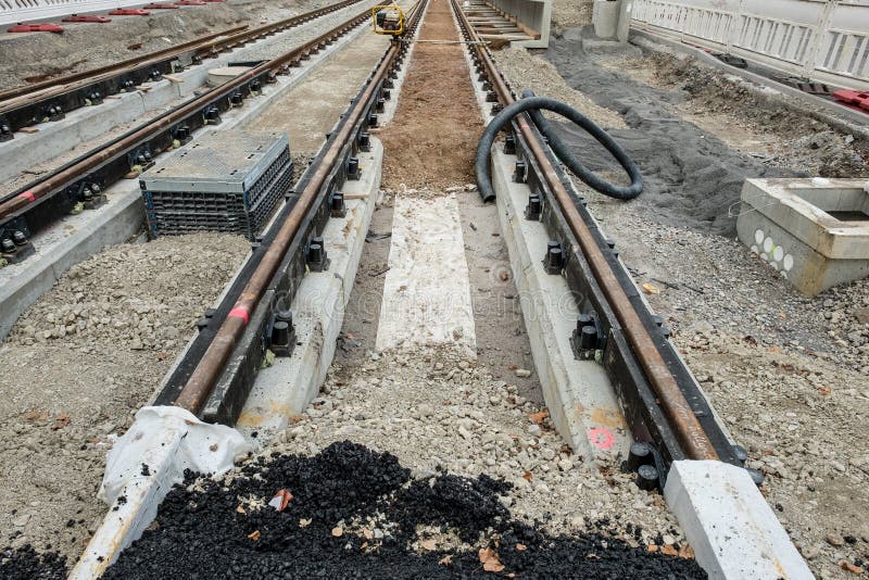 Site with Rails and Construction Material Stock Image - Image of sand ...