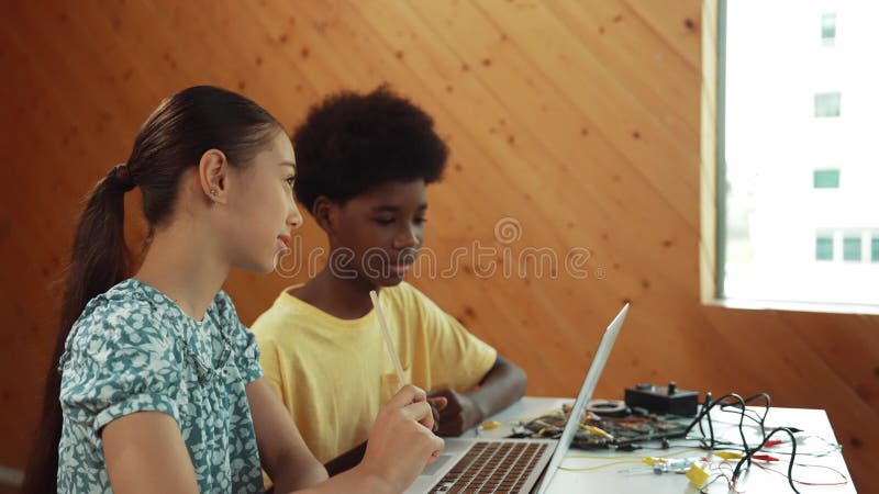 Site View of African Boy and Girl Working Together To Code Prompt ...