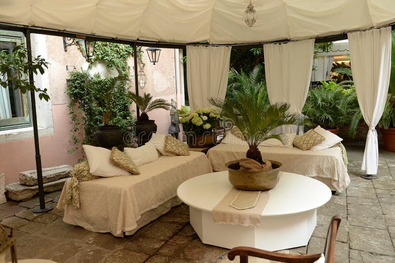 Sitting area on patio stock image. Image of seat, plant - 56655631