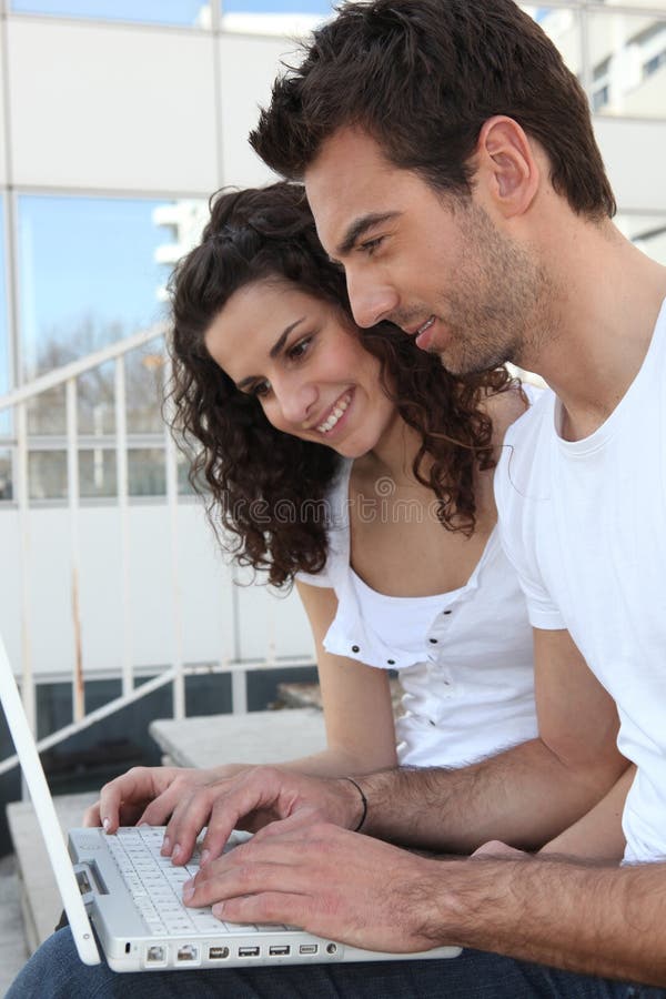 Sitting on Bench with Laptop Stock Photo - Image of beautiful, mobile ...