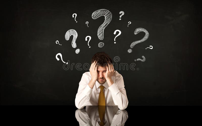 Sitting Businessman Under Question Marks Stock Photo - Image of ...