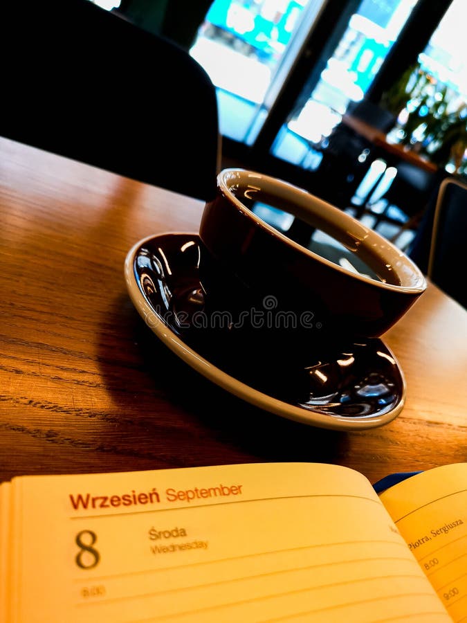 Sitting in Cafe with Cup of Coffee and Planner Stock Photo - Image of ...