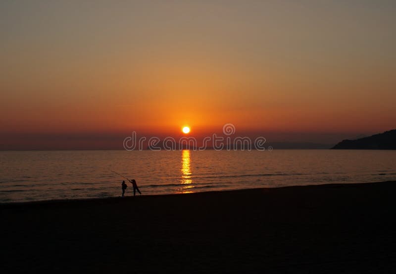 Sitting on the Dock of the Bay Stock Photo - Image of dock, scauri ...