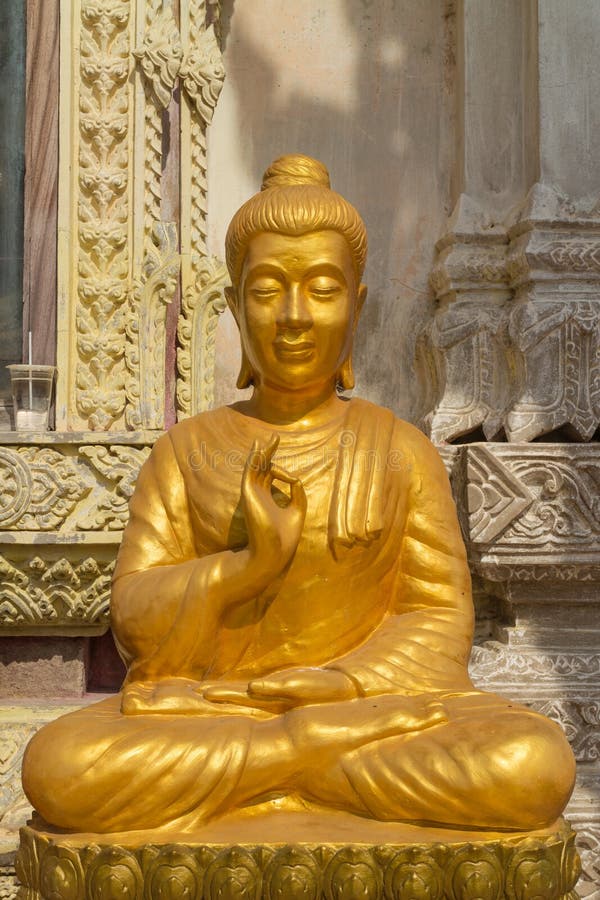 The Sitting Gold Buddha Statue Under Sunlight Stock Image - Image of ...