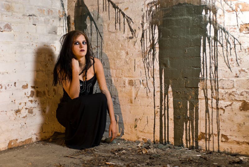 Sitting Goth Girl stock image. Image of alone, posed, lonely - 6354571