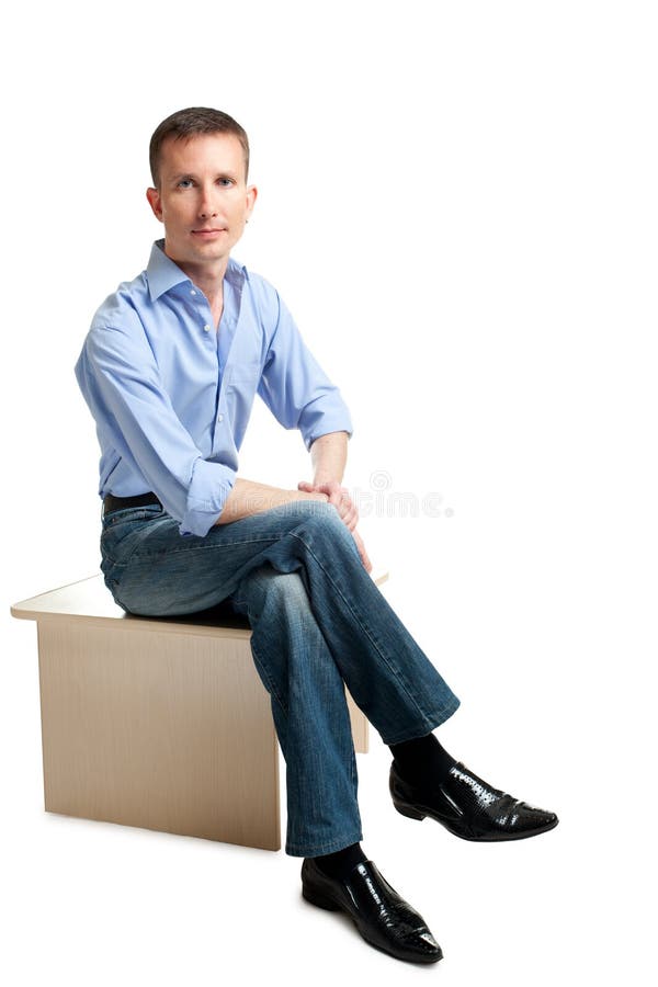 Sitting handsome guy stock image. Image of confident - 14804265
