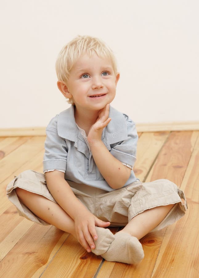Sitting little boy stock image. Image of brother, floor - 12085933