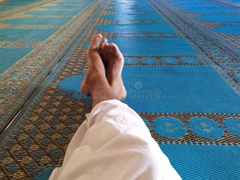 Sitting in mosque stock photo. Image of prayer, foot - 175398298