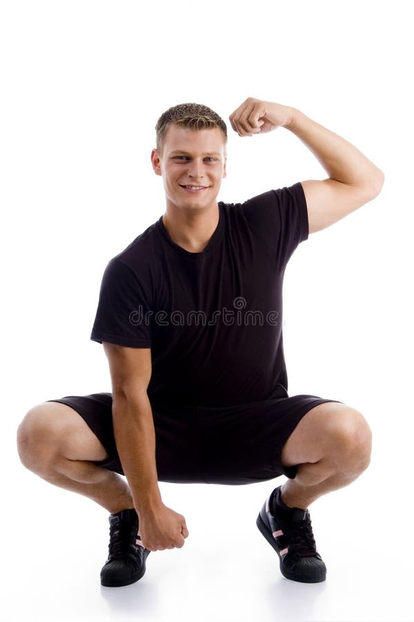 Sitting Muscular Man Showing His Muscles Stock Photo - Image of person ...