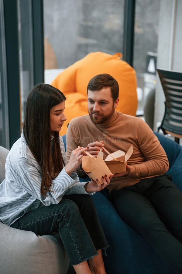 Sitting and Talking. Office Workers are in the Rest Zone is Having a ...