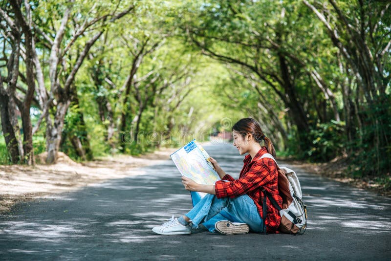 Sitting and Watching the Map on the Road Stock Photo - Image of clean ...