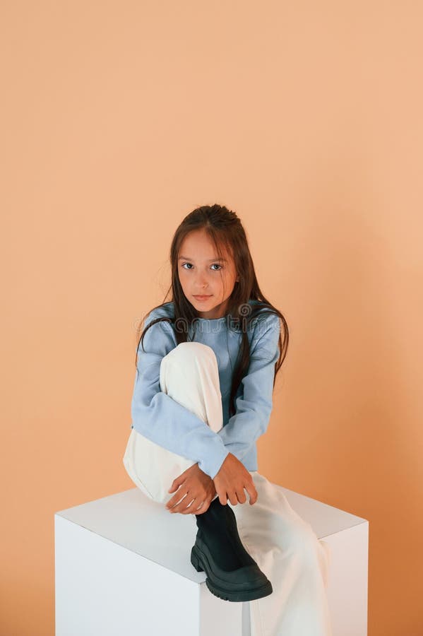 2,573 Girl Sitting White Cube Stock Photos - Free & Royalty-Free Stock ...