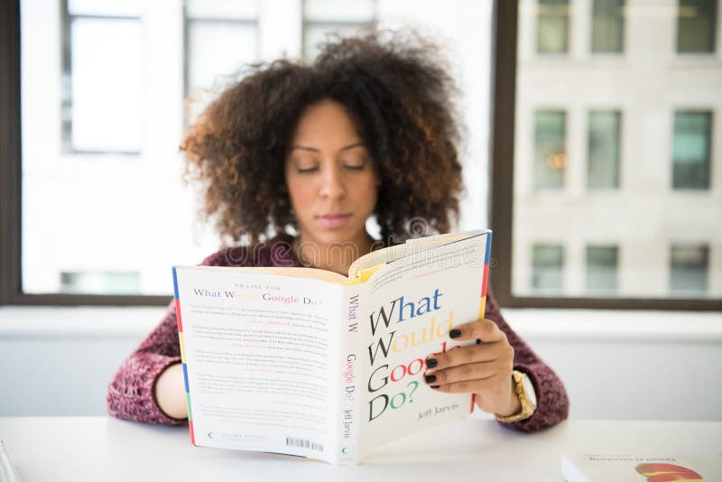 Sitting Woman While Reading Books Near Table Picture. Image: 119666450