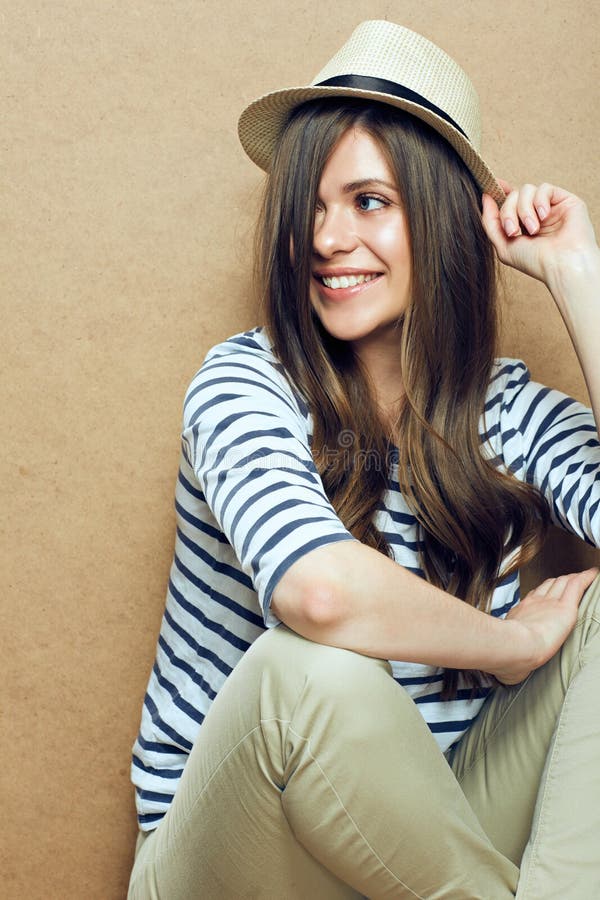 Sitting Woman Wearing Striped Shirt And Hipster Hat Stock Image Image