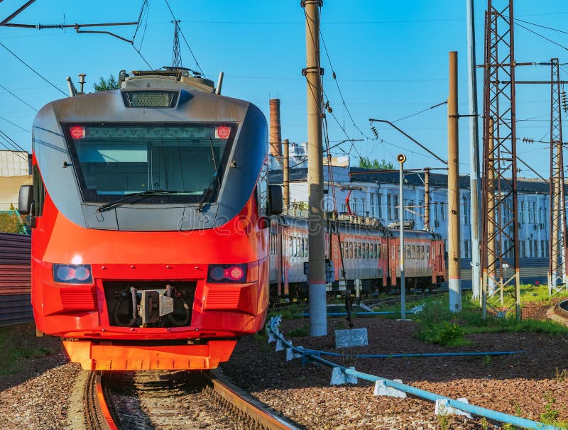 Six-car Commuter Train on the Running Along the Railway Track ...