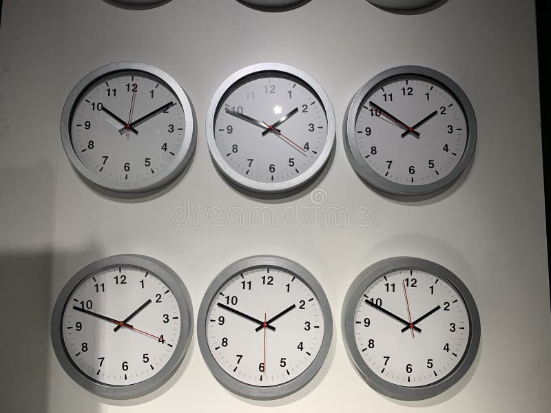 Six Clocks on a White Indoor Wall Stock Image - Image of decoration ...