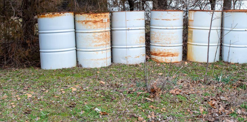 Six Corroded Round Storage Containers Lined Up Stock Photo - Image of ...