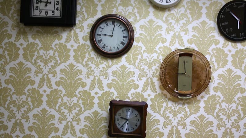 The Six Different Wall Clock Hanging on the Wall Stock Video - Video of ...