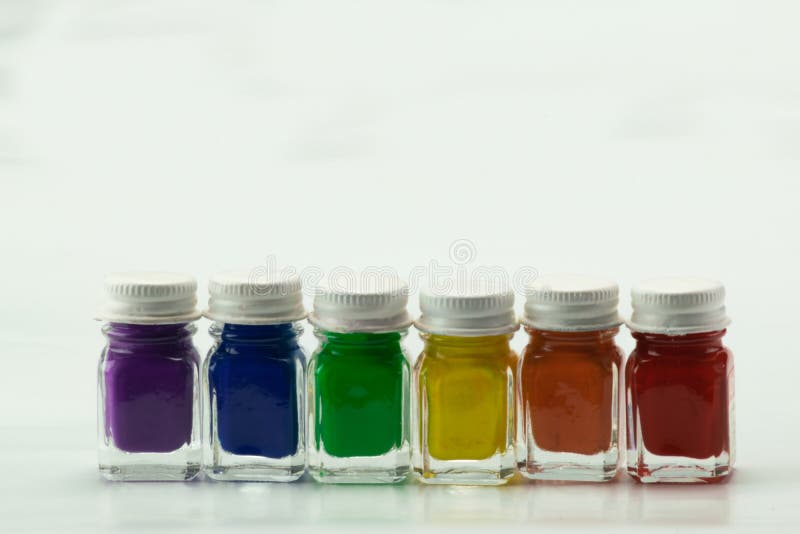 Six glass jar with paint stock image. Image of drive - 204717445