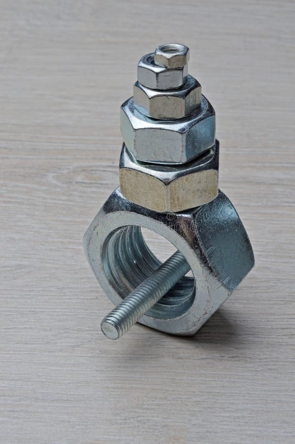 Bolts and Hex Nuts of Various Sizes Stock Photo - Image of gray, shiny ...