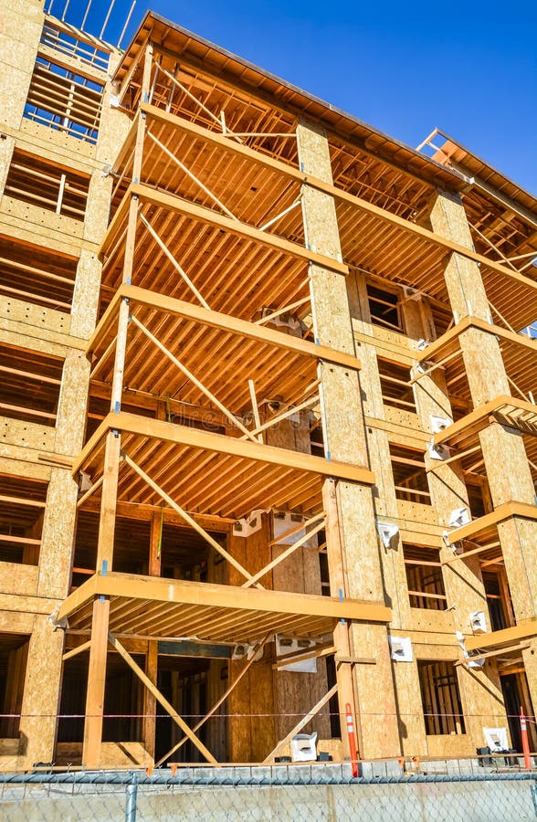 Six Storey Frame Building Under Construction on Concrete Foundation Bed ...