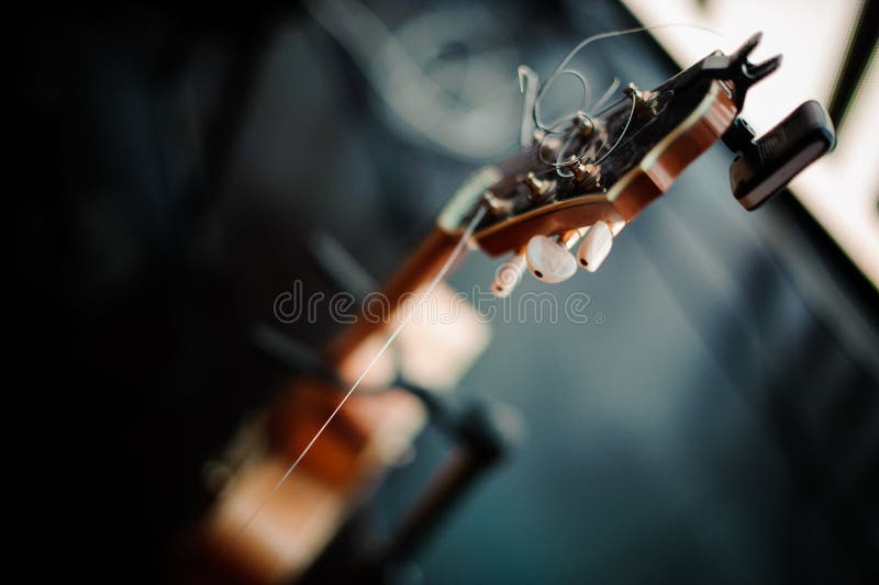 Six-string Acoustic Guitar on a Stand Stock Photo - Image of play ...