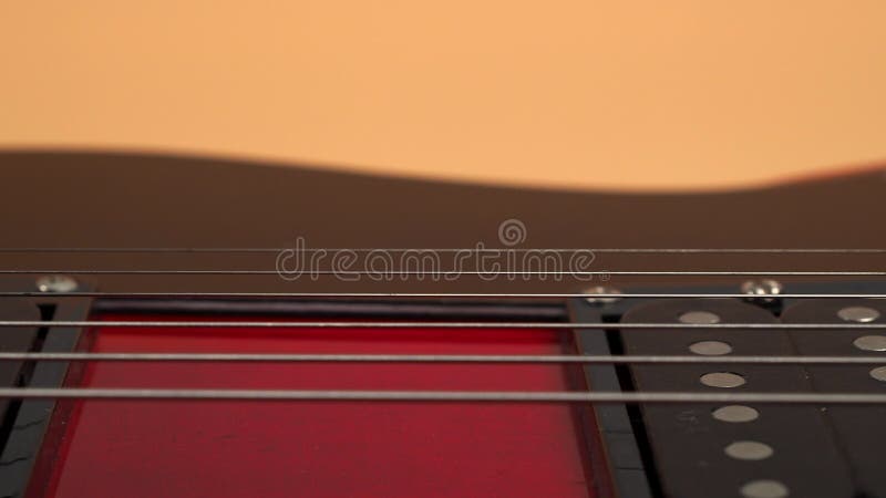 Six-string Electric Guitar. the Camera Moves To the Rhythm of the ...
