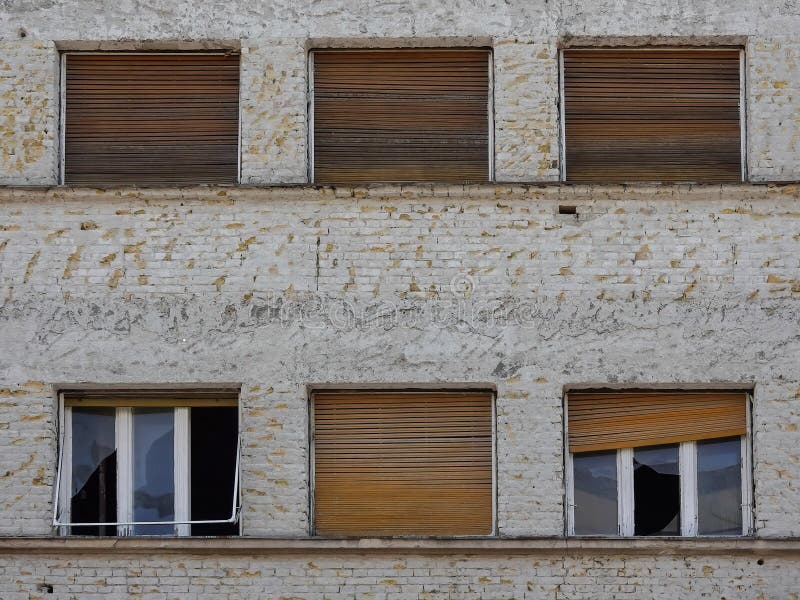 Six Windows on the Wall - Two of Them with Broken Glass, the Other with ...
