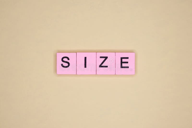 Size Word Wooden Cubes on Yellow Background. Stock Photo - Image of ...