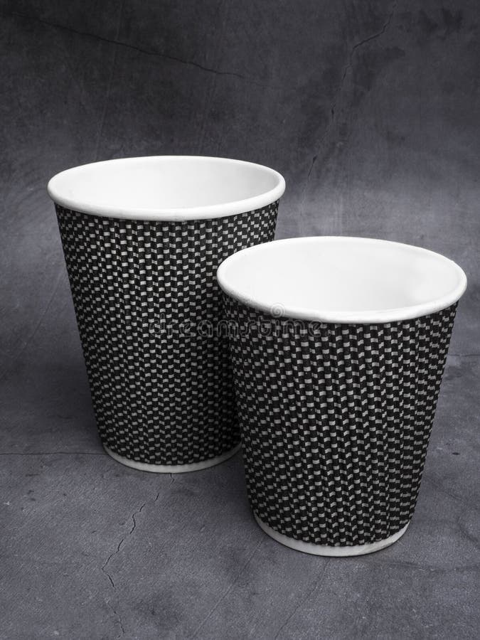 2 Sizes of Plastic and Paper Coffee Cup on Grey Table Stock Image ...
