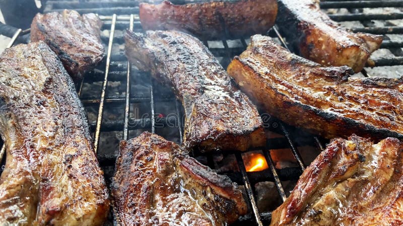 Sizzling Grilled Pork Steak on a Charcoal Grill Stock Footage - Video ...