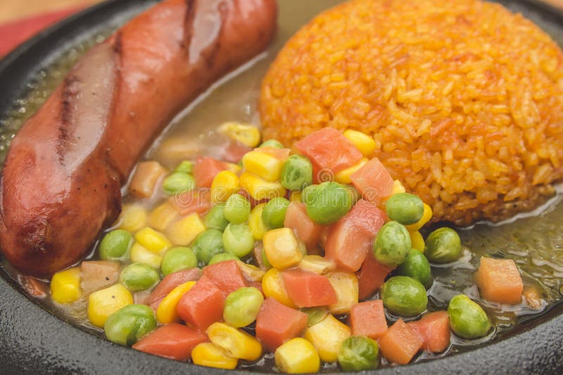 Sizzling Hungarian Sausage, Served with Mixed Vegetables and Java Rice ...