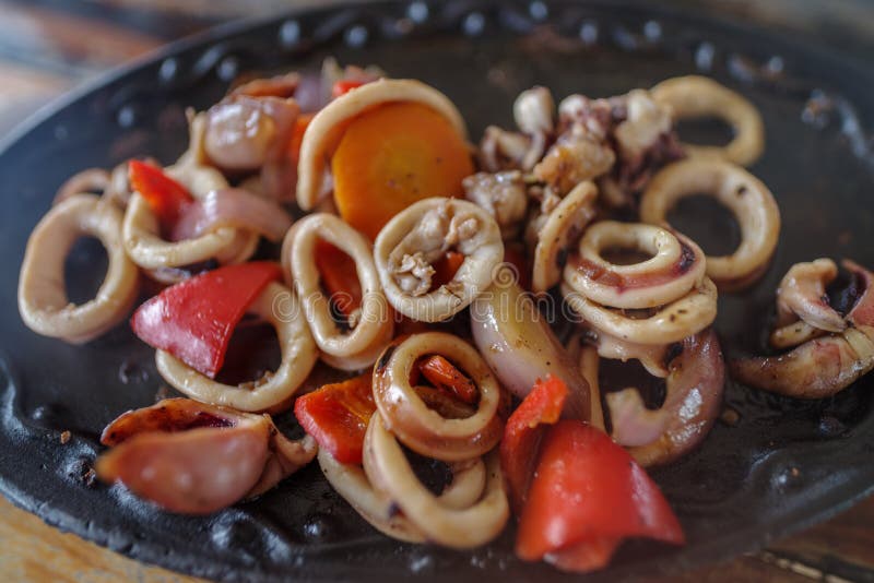 Sizzling squid stock image. Image of food, cuisine, recipe - 83523297