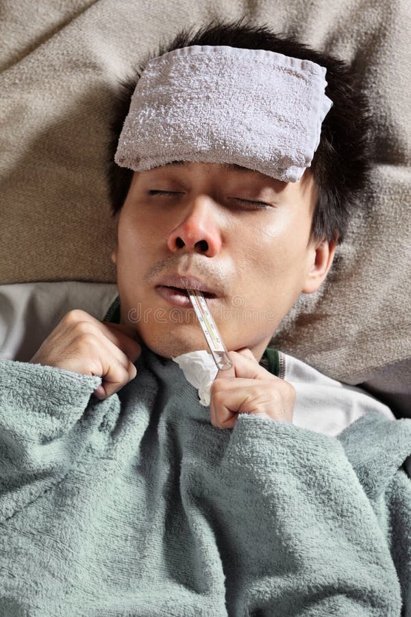Sjuk person arkivfoto. Bild av asiatisk, feber, influensa - 16060228