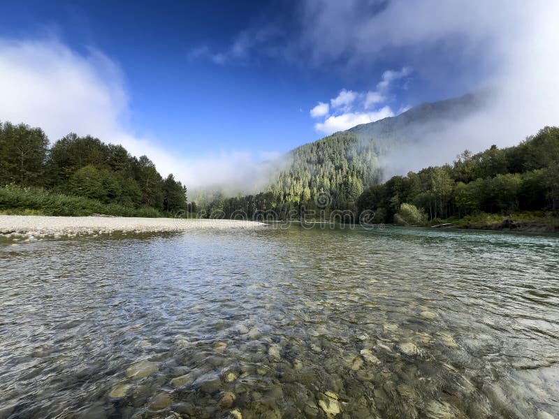 Skagit River in Washington State with Clouds and Cascade Mountains in ...