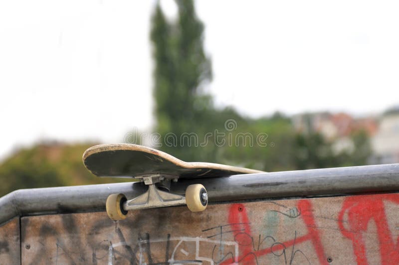Skate Board Left Behind in Park Stock Photo - Image of summer, color ...