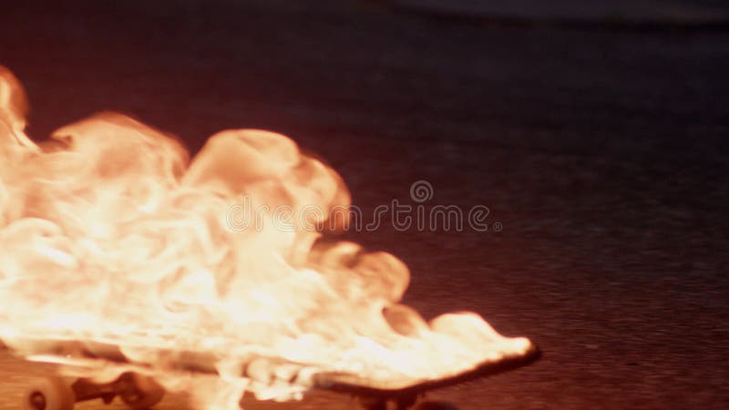 Skateboard on fire stock video. Video of streets, speed - 74618205