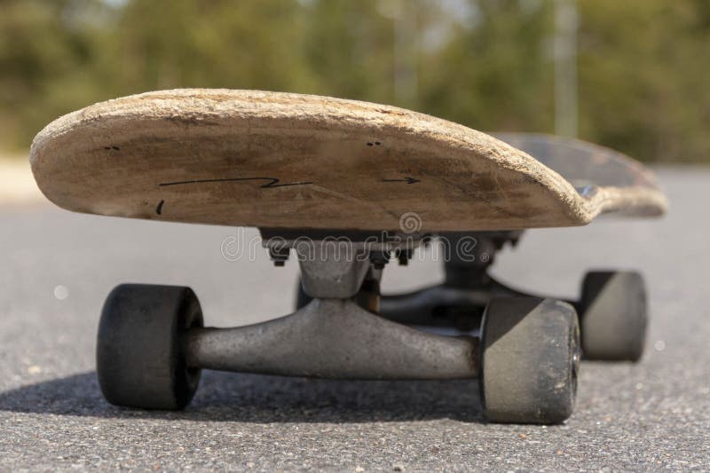 The Skateboard is Ready for New Tricks on the Asphalt Track in the Park ...
