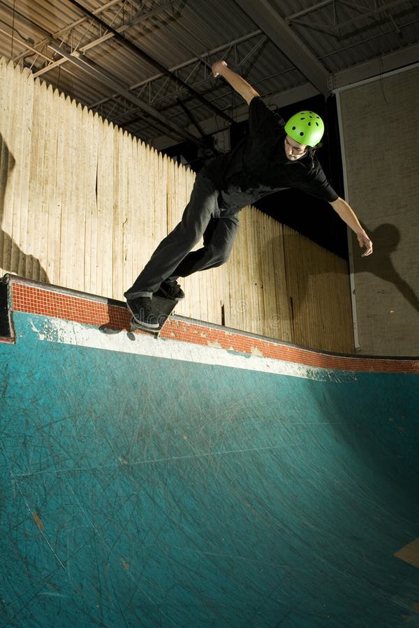 Skateboarder Doing Backside Smith Grind On Ramp Stock Photo - Image of ...