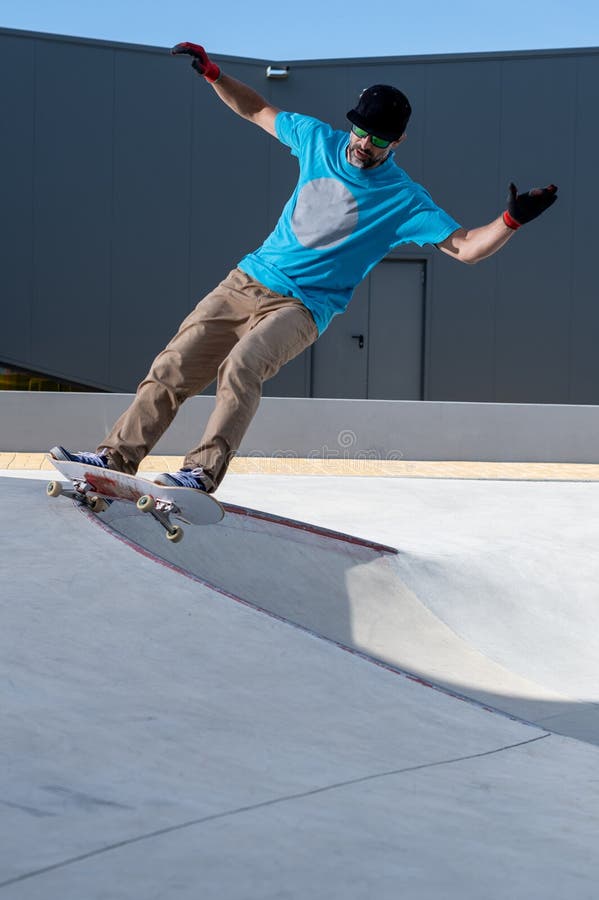 Skateboarder Doing Frontside Five-o Grind Trick Stock Image - Image of ...