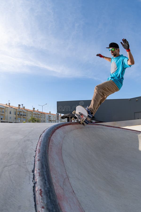 Skateboarder Doing Frontside Five-o Grind Trick Stock Photo - Image of ...