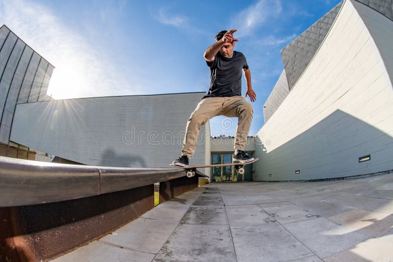 Skateboarder Doing a Nose Slide Trick Stock Image - Image of skateboard ...