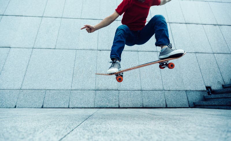 Skateboarder doing ollie stock image. Image of determined - 133531211