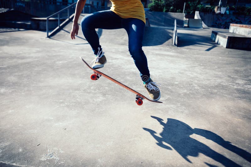 Skateboarder doing ollie stock image. Image of sunny - 132810647