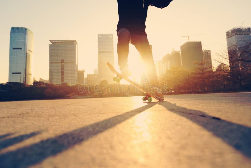 Skateboarder Doing an Ollie Trick Stock Image - Image of city, golden ...