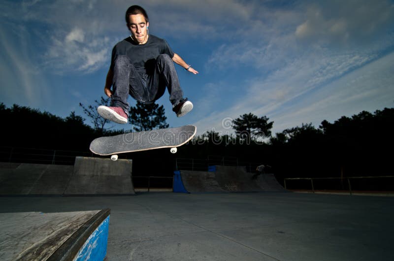 Skateboarder on a Flip Trick Stock Photo - Image of sports, skater ...