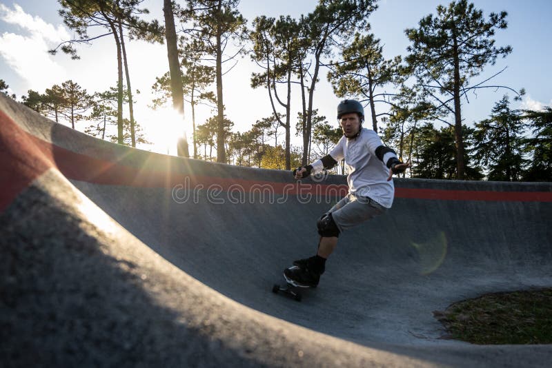 Skateboarder Practice on a Pump Track Park Stock Image - Image of shoes ...