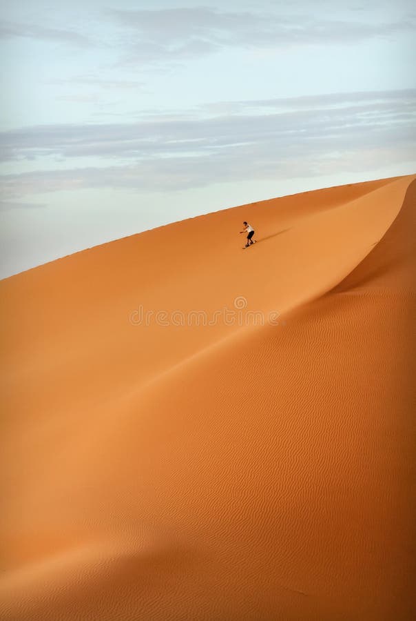 Skateboarder Rides on the Dunes in the Sahara Desert Editorial ...