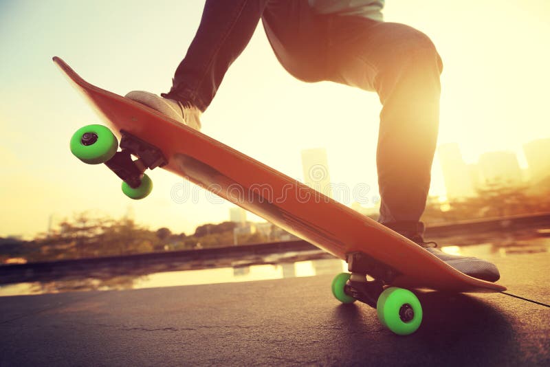 Skateboarder Riding on Skateboard Stock Image - Image of concrete, jump ...